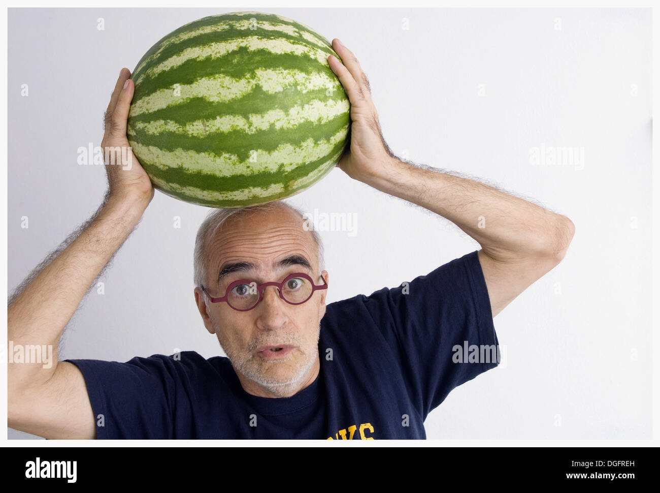 Melon head man holding melon hi-res stock photography and images - Alamy