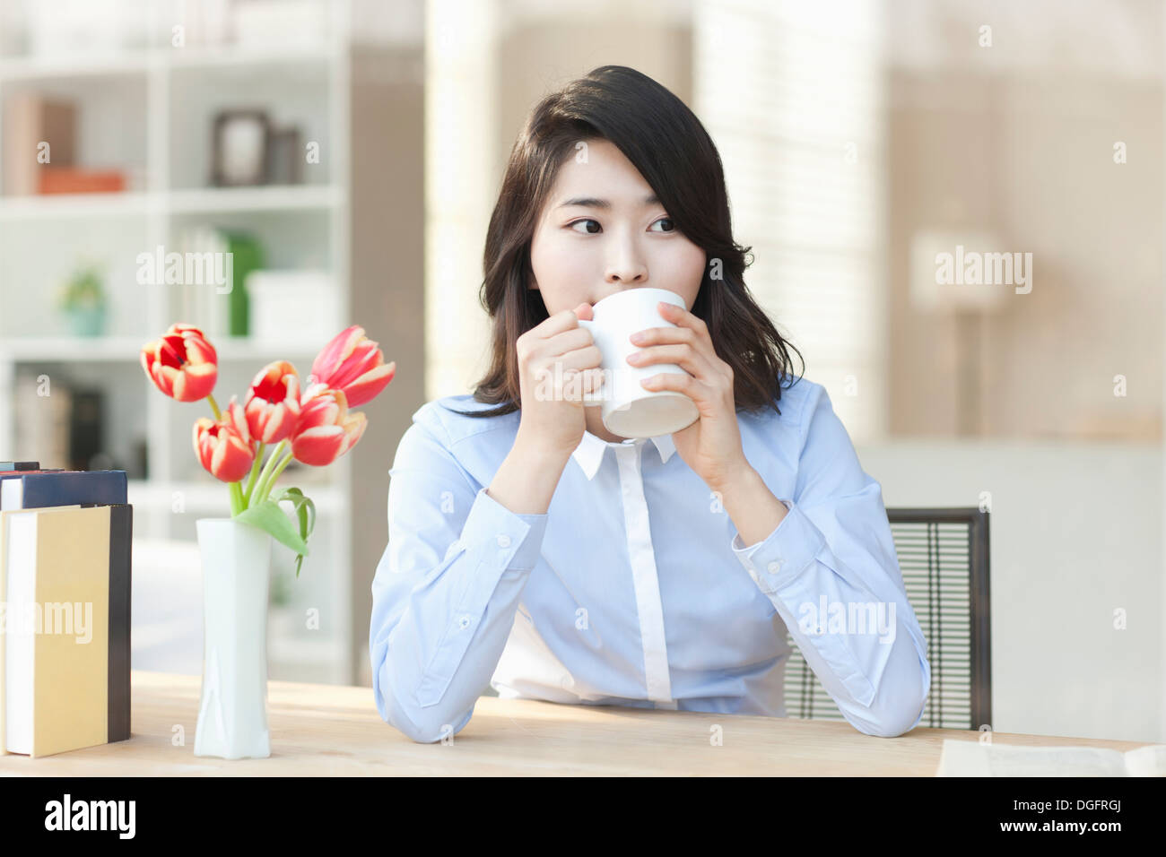 Woman desk coffee hi-res stock photography and images - Alamy