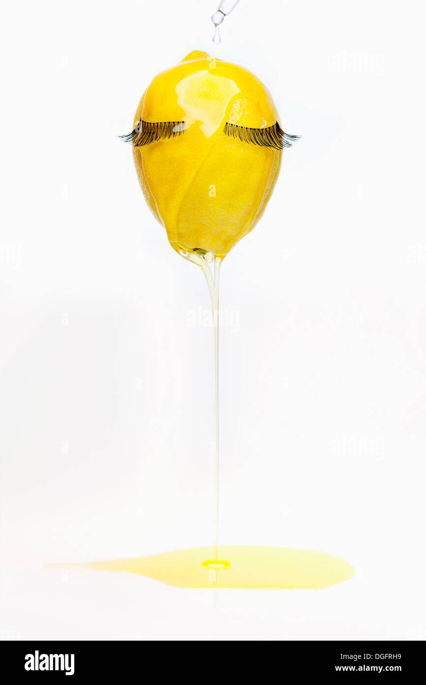 an image of an lemon having fake eye lashes Stock Photo - Alamy