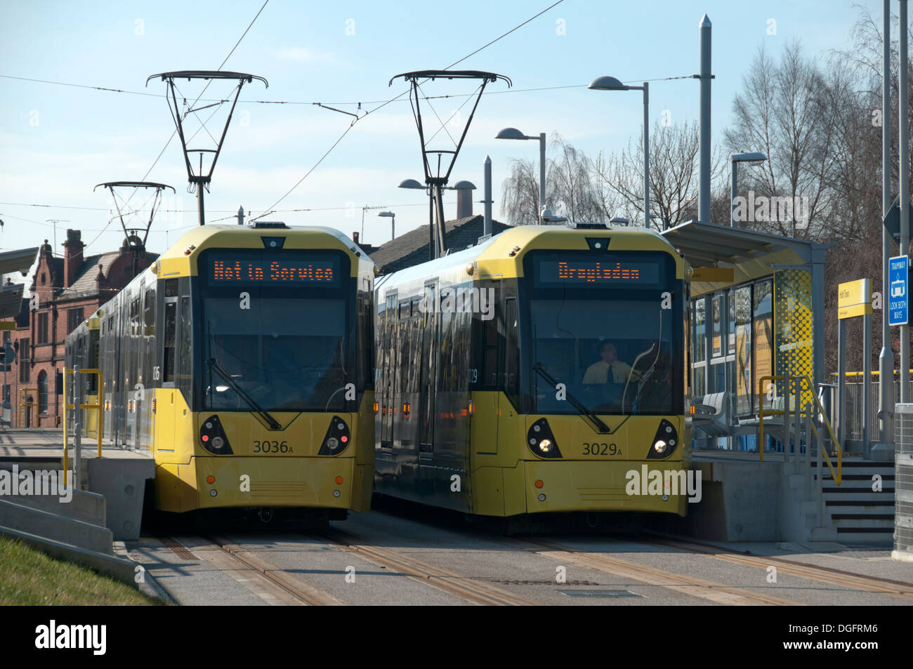 Two Metrolink trams at the Holt Town stop, on the East Manchester Line ...