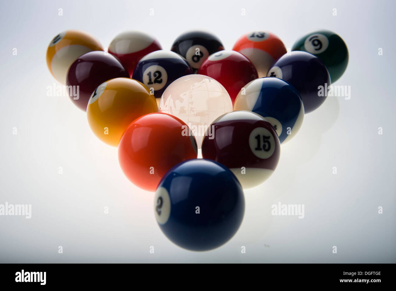a set of billiard balls and a glass ball Stock Photo - Alamy