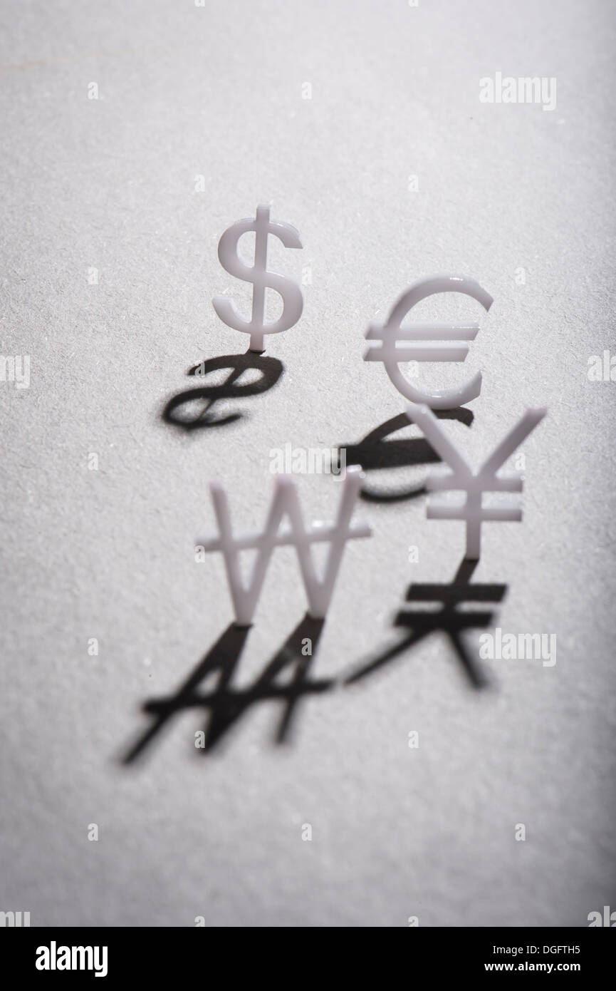 an image with several currency signs standing Stock Photo - Alamy
