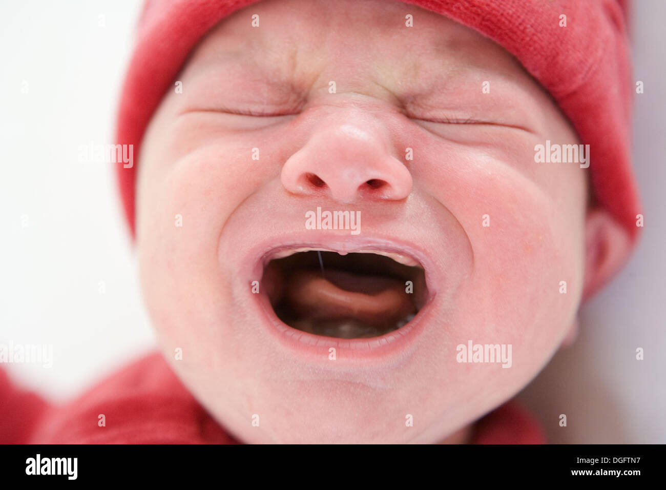 Baby crying alone hi-res stock photography and images - Alamy