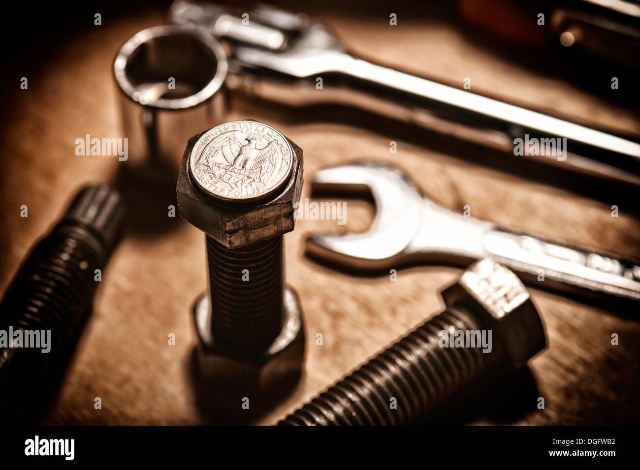 a set of tools and a coin Stock Photo - Alamy