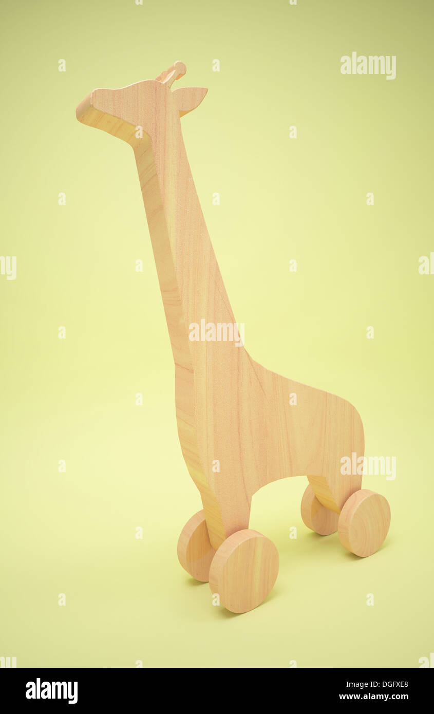 a wooden toy giraffe on wheels Stock Photo - Alamy