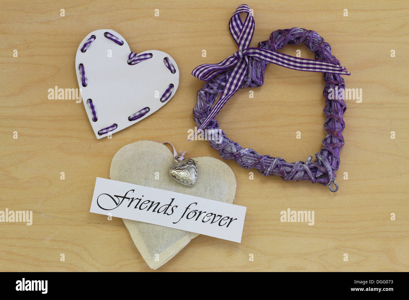 Selection of hearts on wooden surface Stock Photo - Alamy