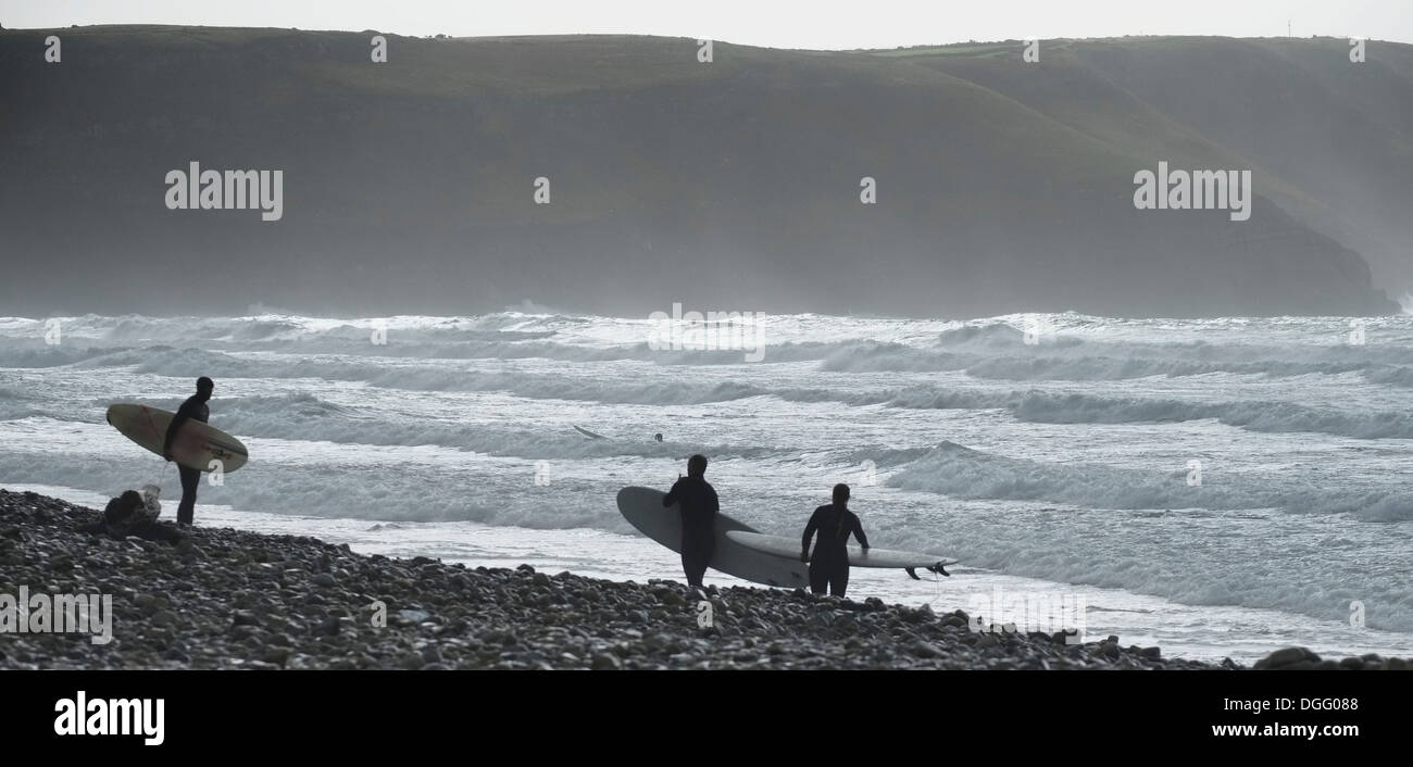 Surfing in wild seas at Porth Neigwl, North Wales Stock Photo - Alamy