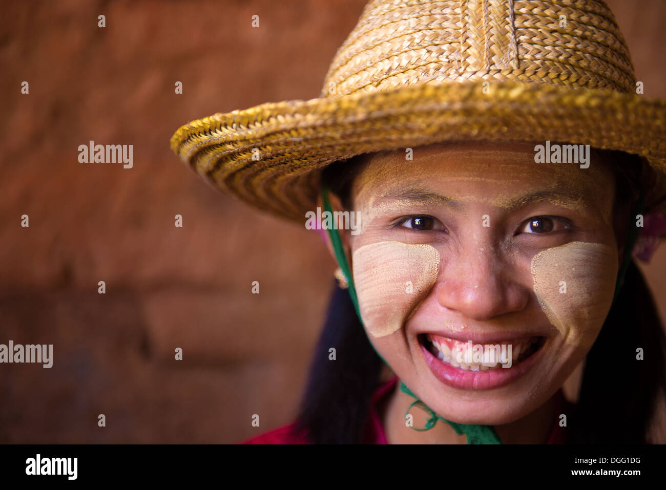 close up myanmar female face with traditional thanaka painting ...