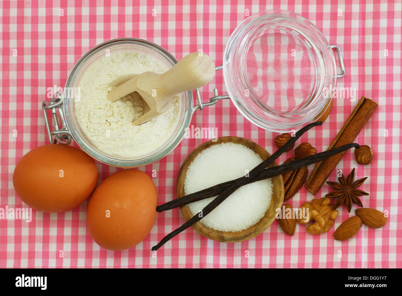 Selection of baking ingredients on pink checkered cloth Stock Photo - Alamy