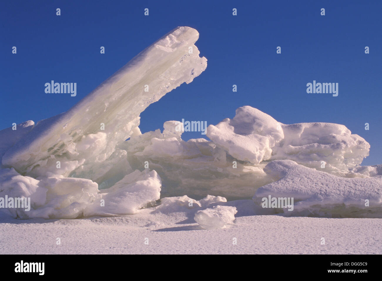 Winter ice pressure ridge and blue sky on Lake Winnipeg at Hecla ...