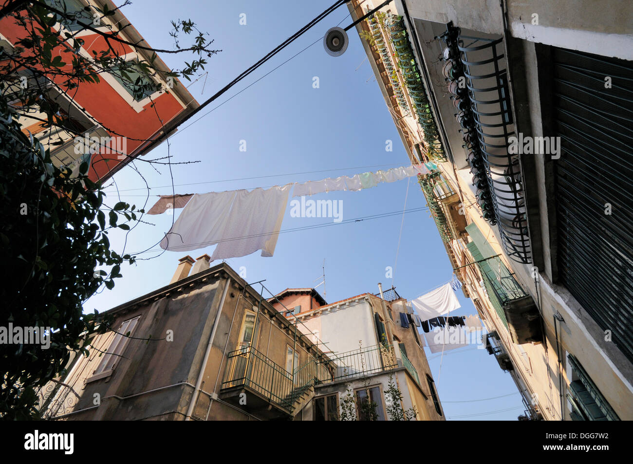 Laundry hanging on washing lines to dry between houses, Castello ...