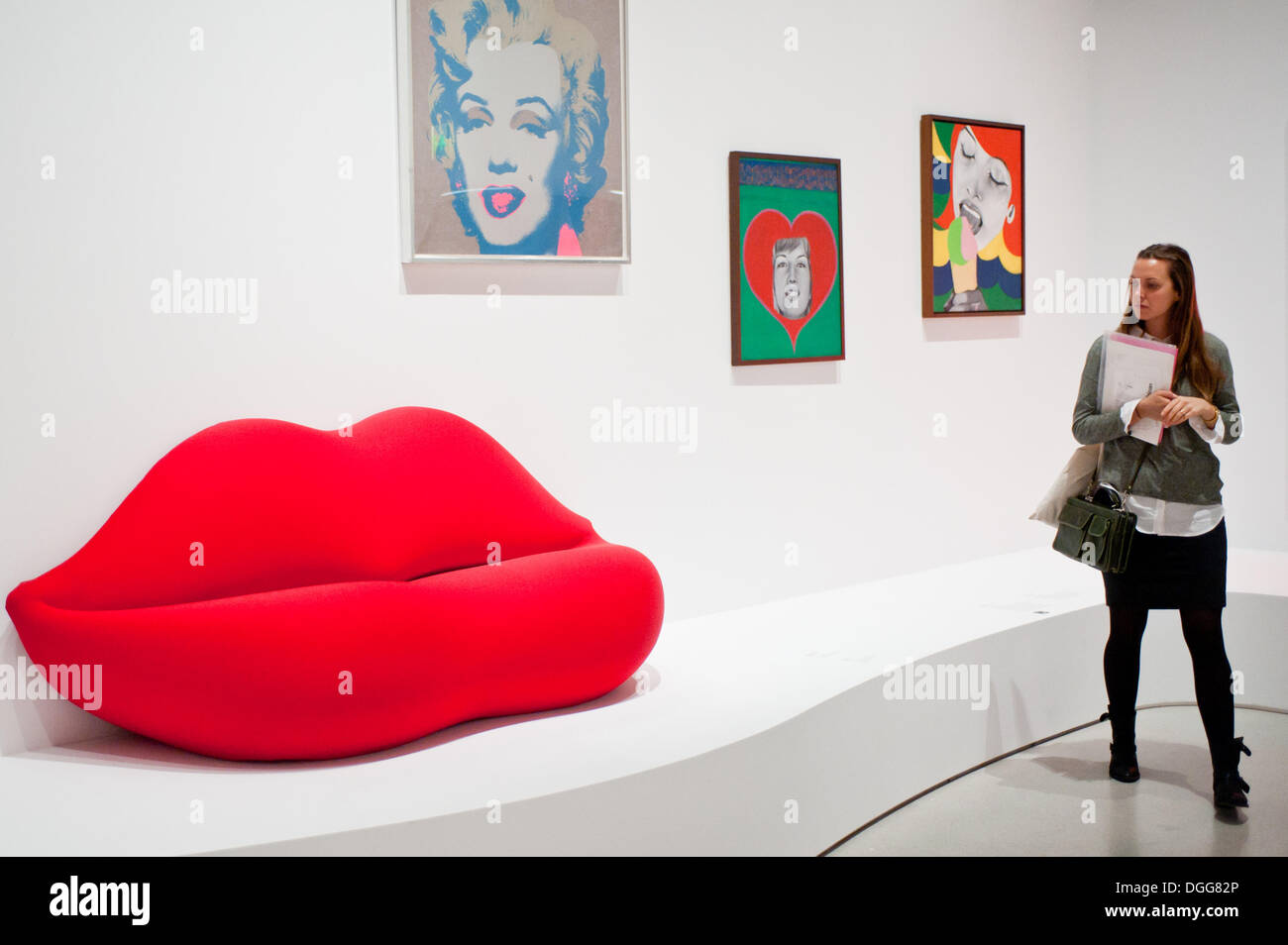 London, UK - 21 October 2013: a visitor walks past 'La Bocca' by Studio ...