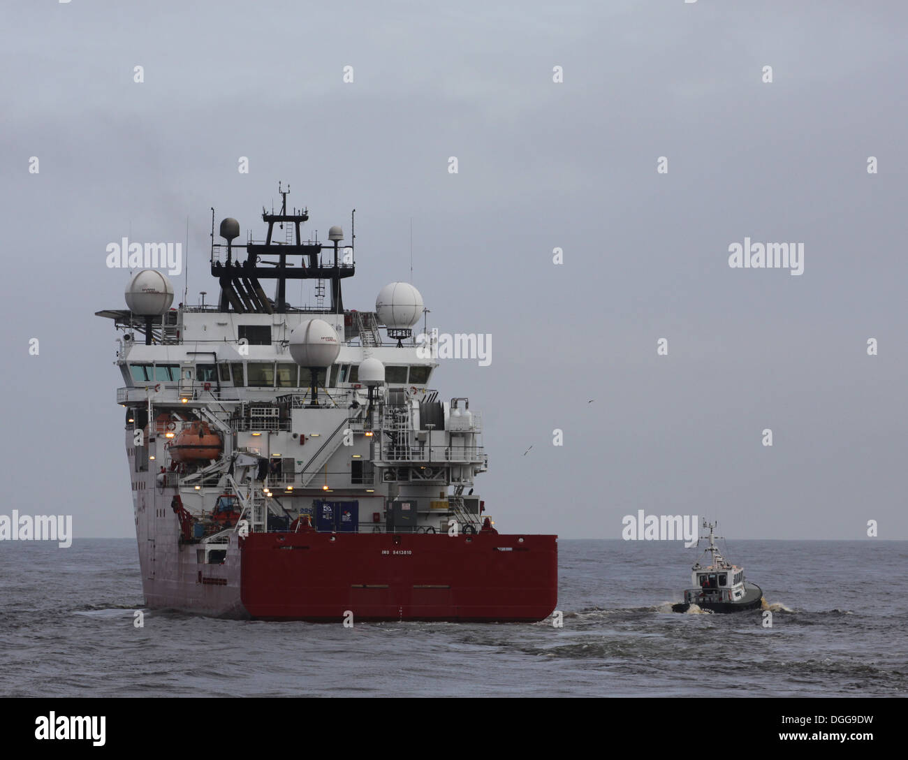 Diving support vessel Skandi Achiever and pilot boat off coast of ...