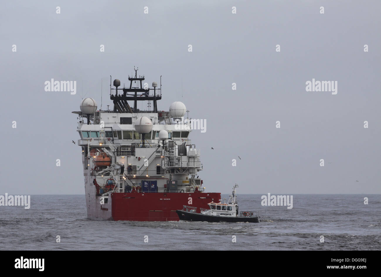 Diving support vessel Skandi Achiever and pilot boat off coast of ...