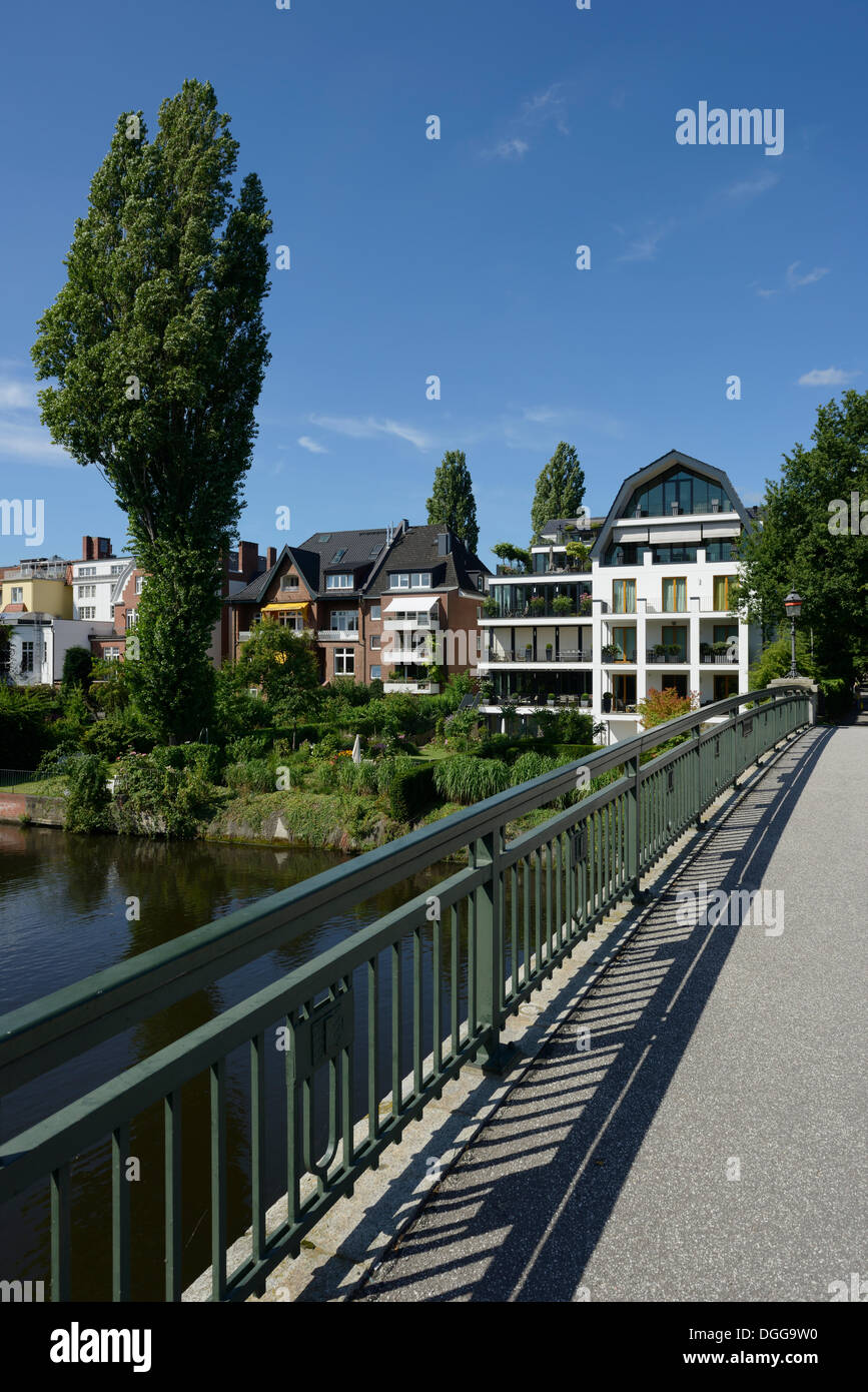 Residential houses, bridge across the Alster river, Leinpfad walkway ...