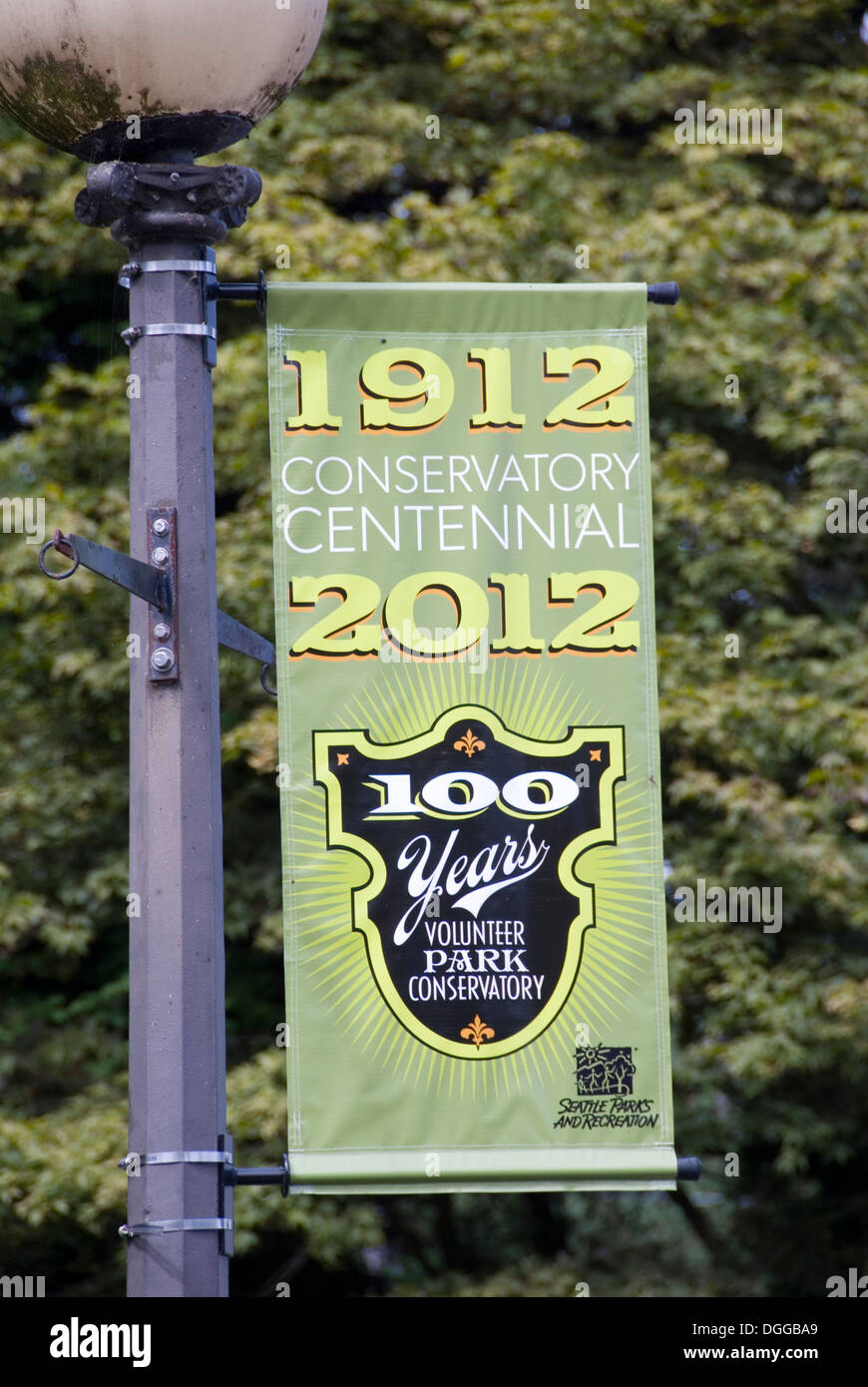 Close up on a green banner celebrating the centennial year of the ...