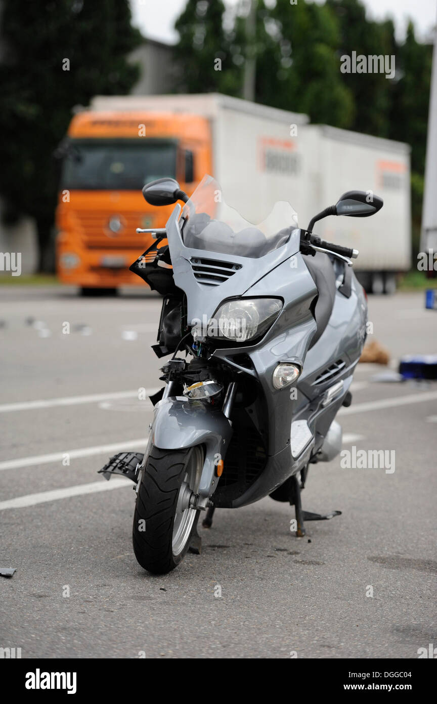 Motorcycle standing at a crash site, traffic accident caused by a ...