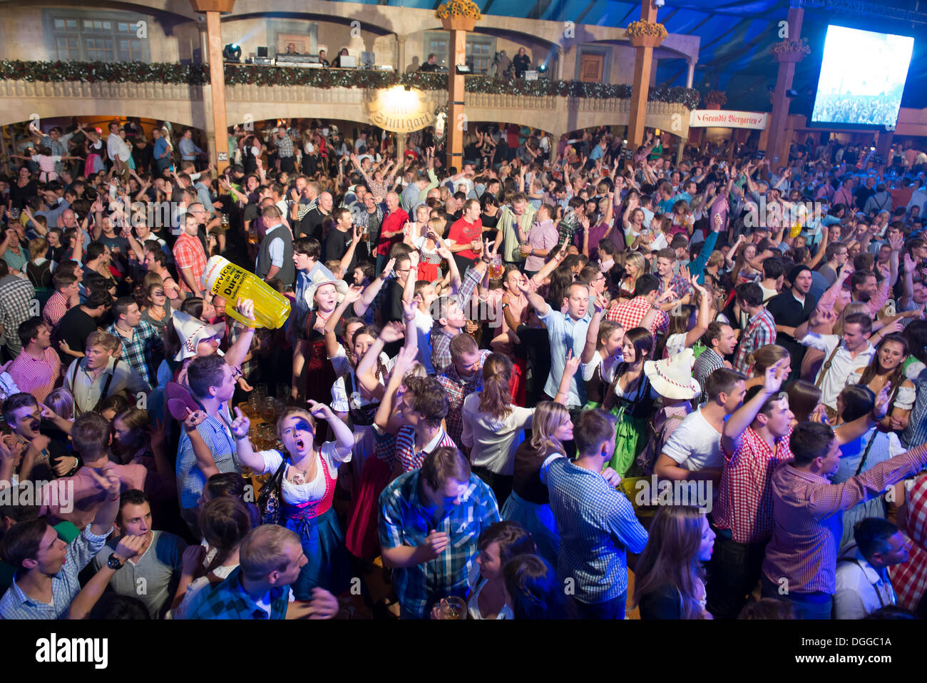 Party in a beer tent, Cannstatter Wasen fairground, funfair, Bad ...