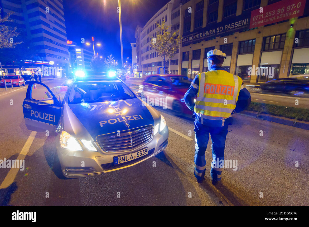 Police control, police cars with blue lights at night, Theodor-Heuss ...