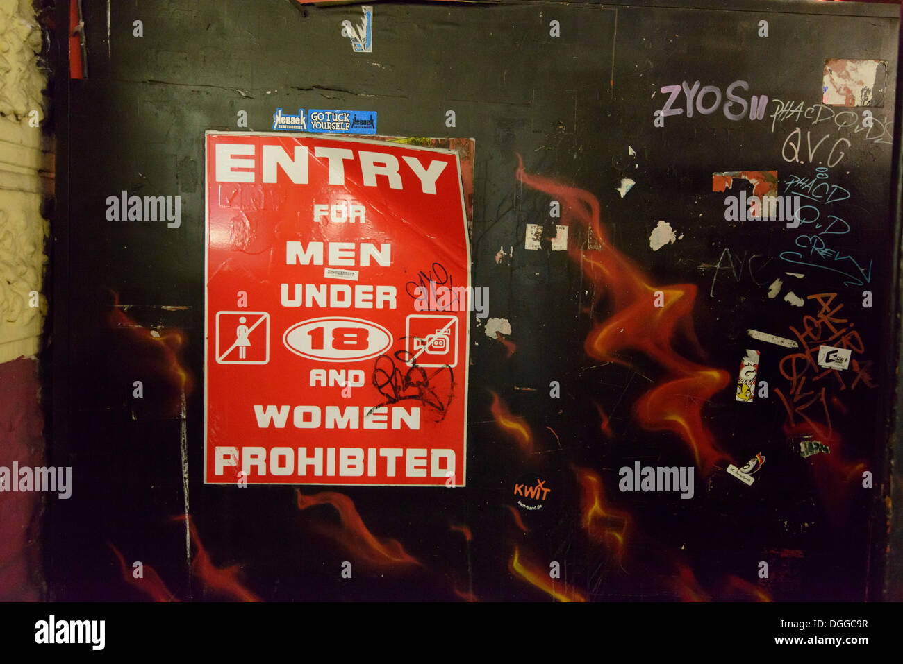 Sign "Entry for men under 18 and women prohibited" at the entrance to ...