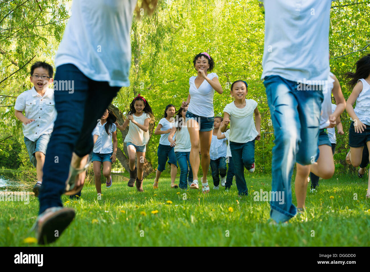 People running in park Stock Photo - Alamy