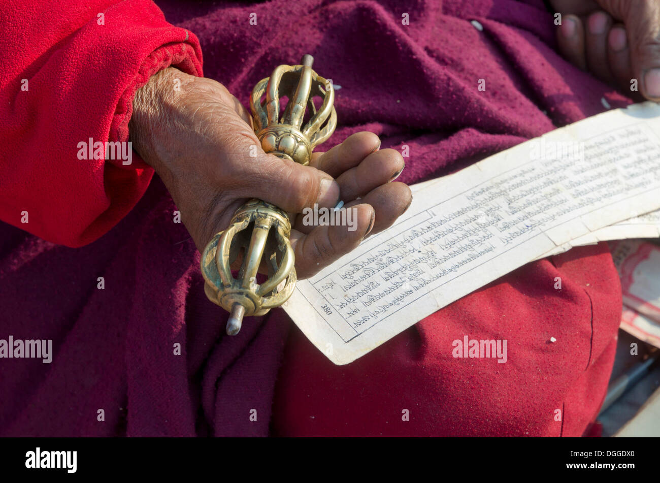 Tibetean monk reading the holy scriptures in Tibetan language, at the ...