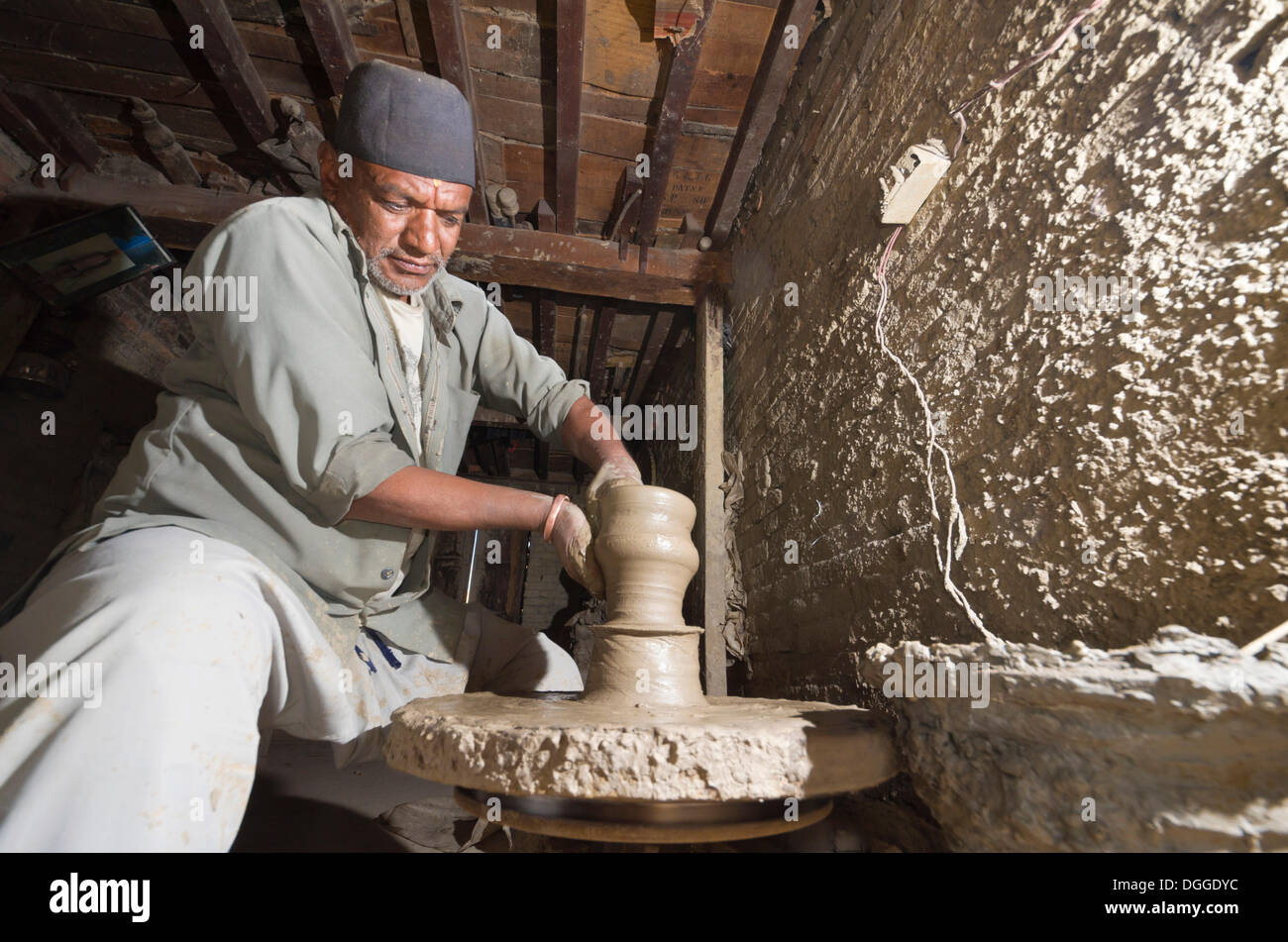 Nepalese men making pottery hi-res stock photography and images - Alamy