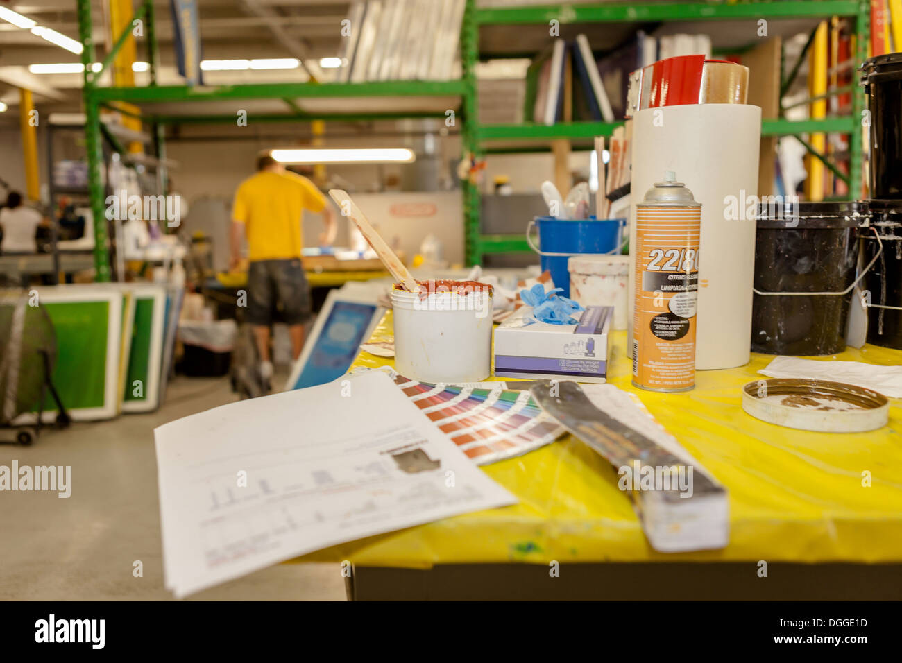 Ink and swatches on bench in screen printing workshop Stock Photo - Alamy