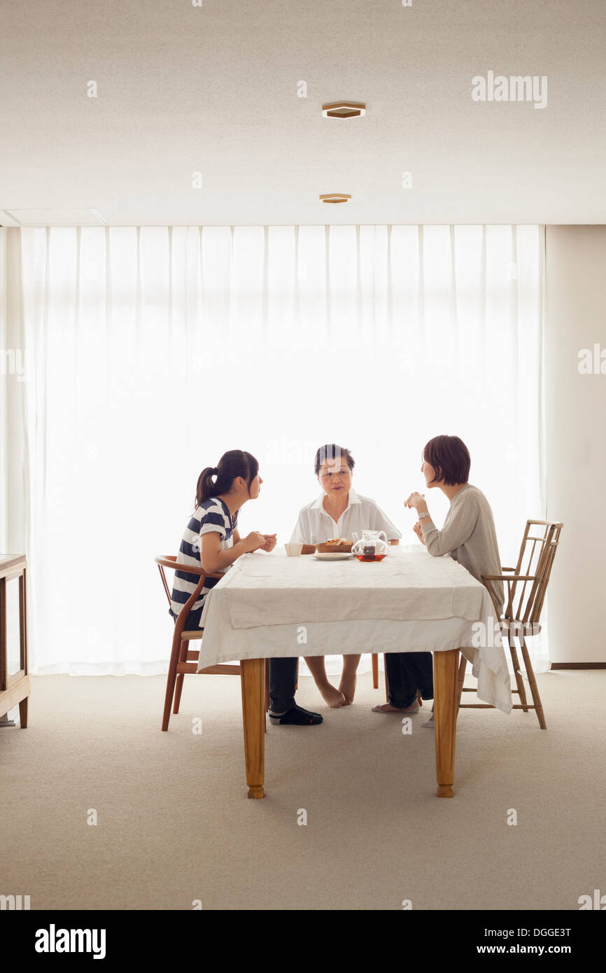 Three generation family at table hi-res stock photography and images ...