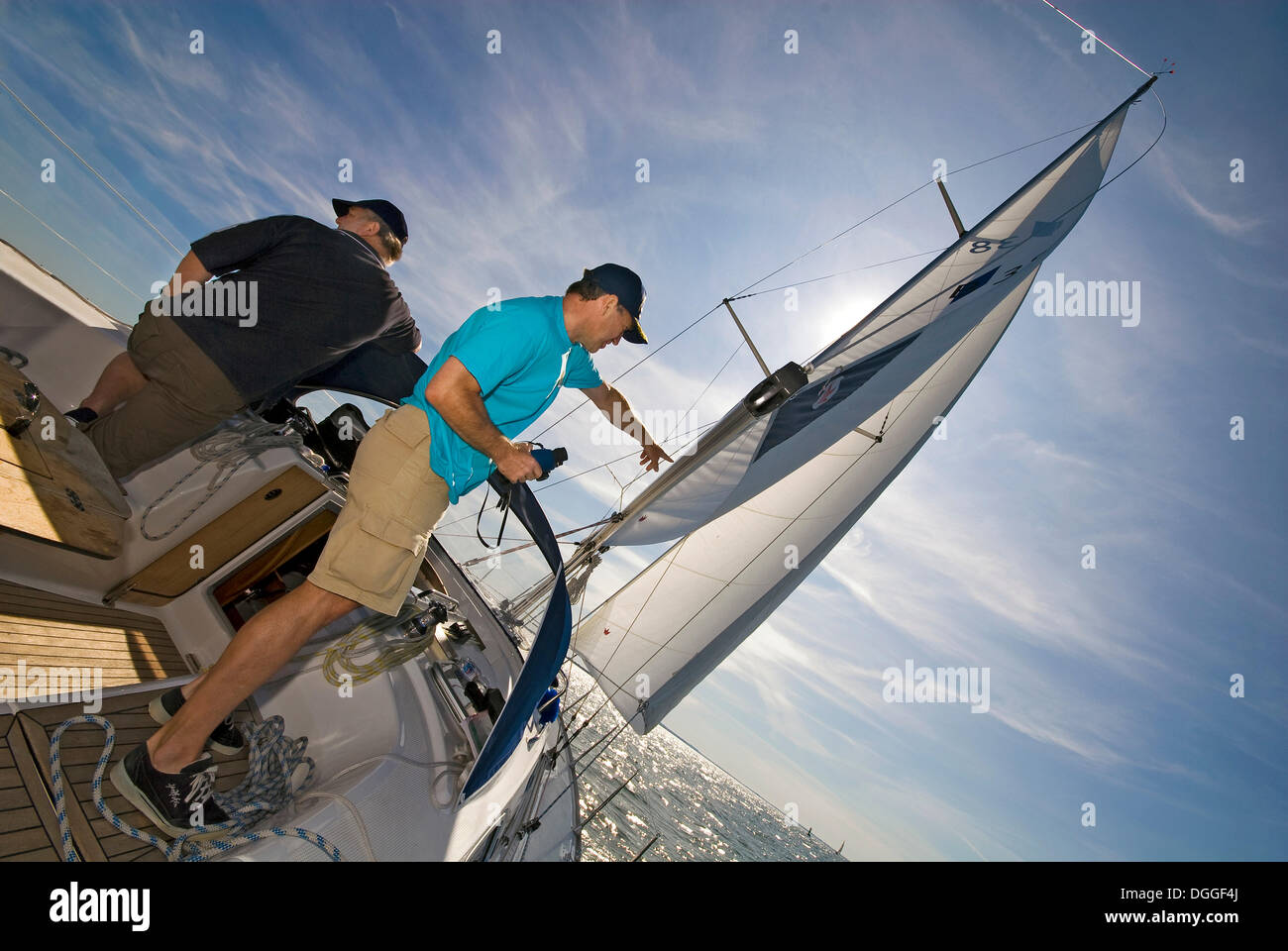 Two men on their yacht Stock Photo - Alamy