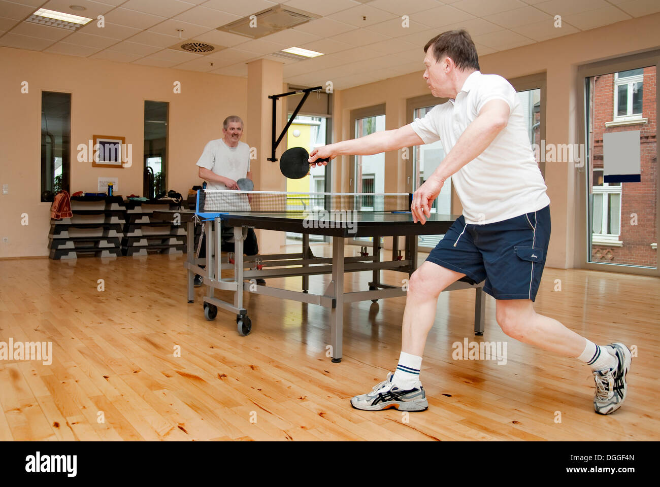 Two men play table tennis hi-res stock photography and images - Alamy
