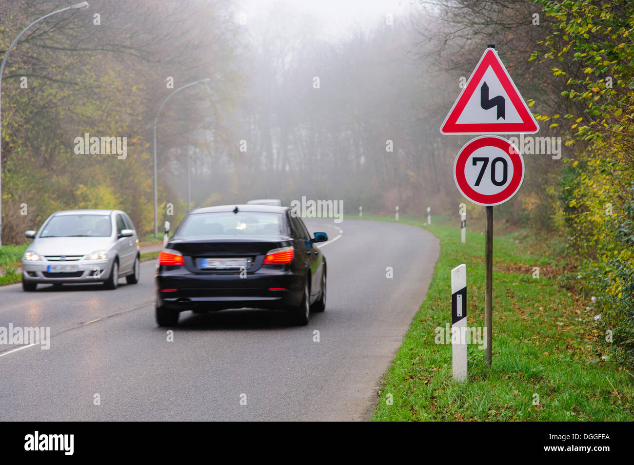 Double curve road traffic sign hi-res stock photography and images - Alamy