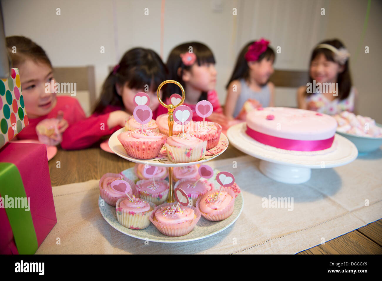 Fairy cakes at girl's birthday party Stock Photo - Alamy