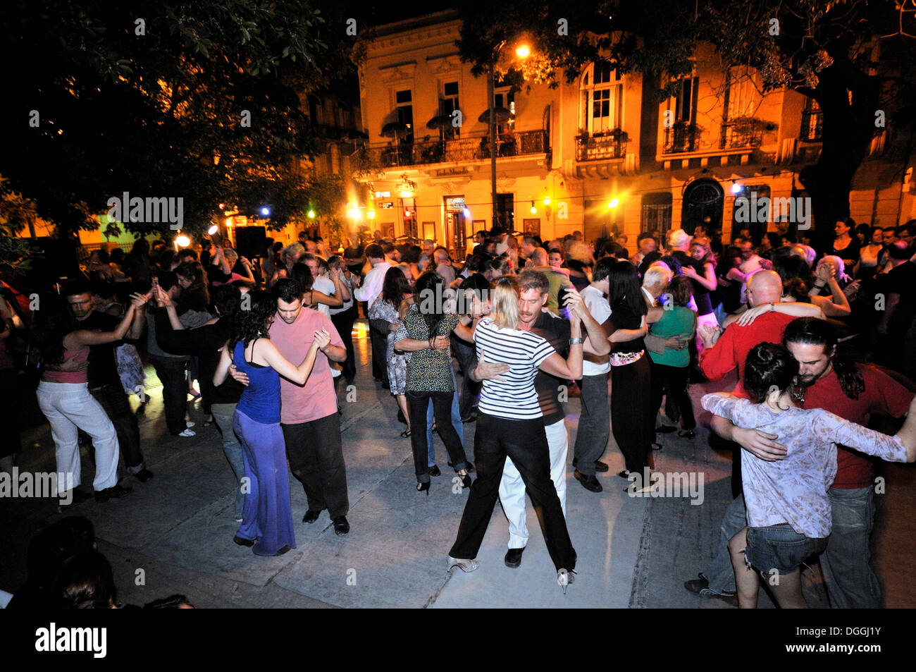 Dancing couples at a Milonga, tango event on the Plaza Dorrego square ...