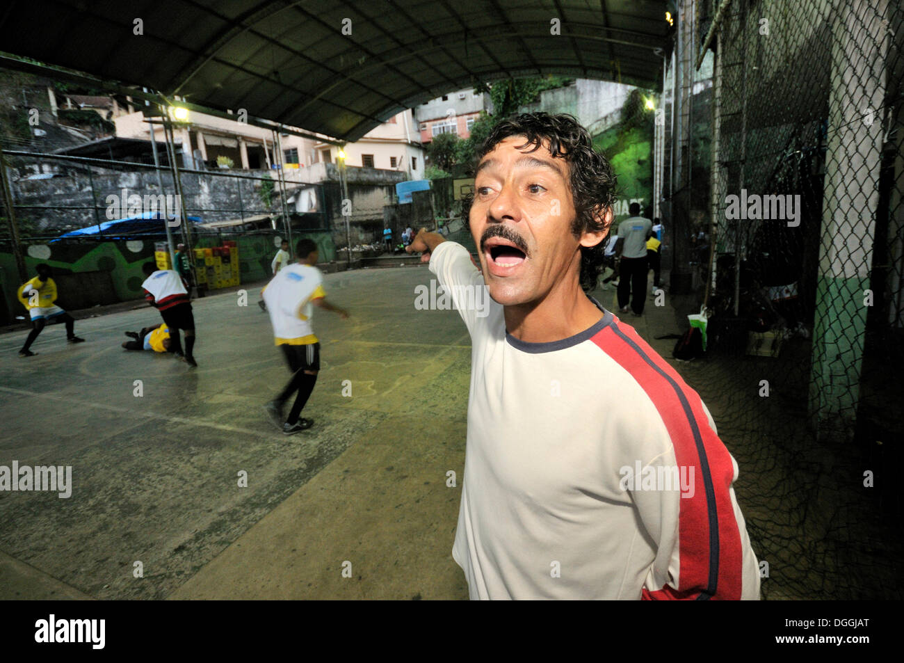 Soccer training on a sports field, Favela Morro da Formiga slum, Tijuca ...