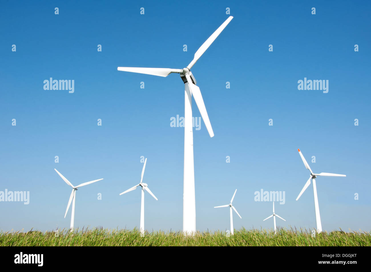 Wind turbine farm and blue sky background Stock Photo - Alamy