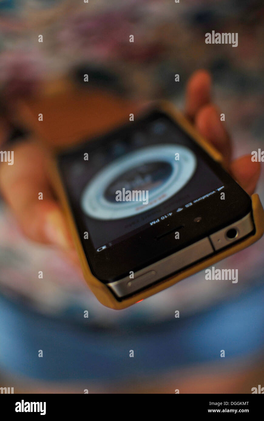 Young woman using app for instant measuring of heart rate Stock Photo ...