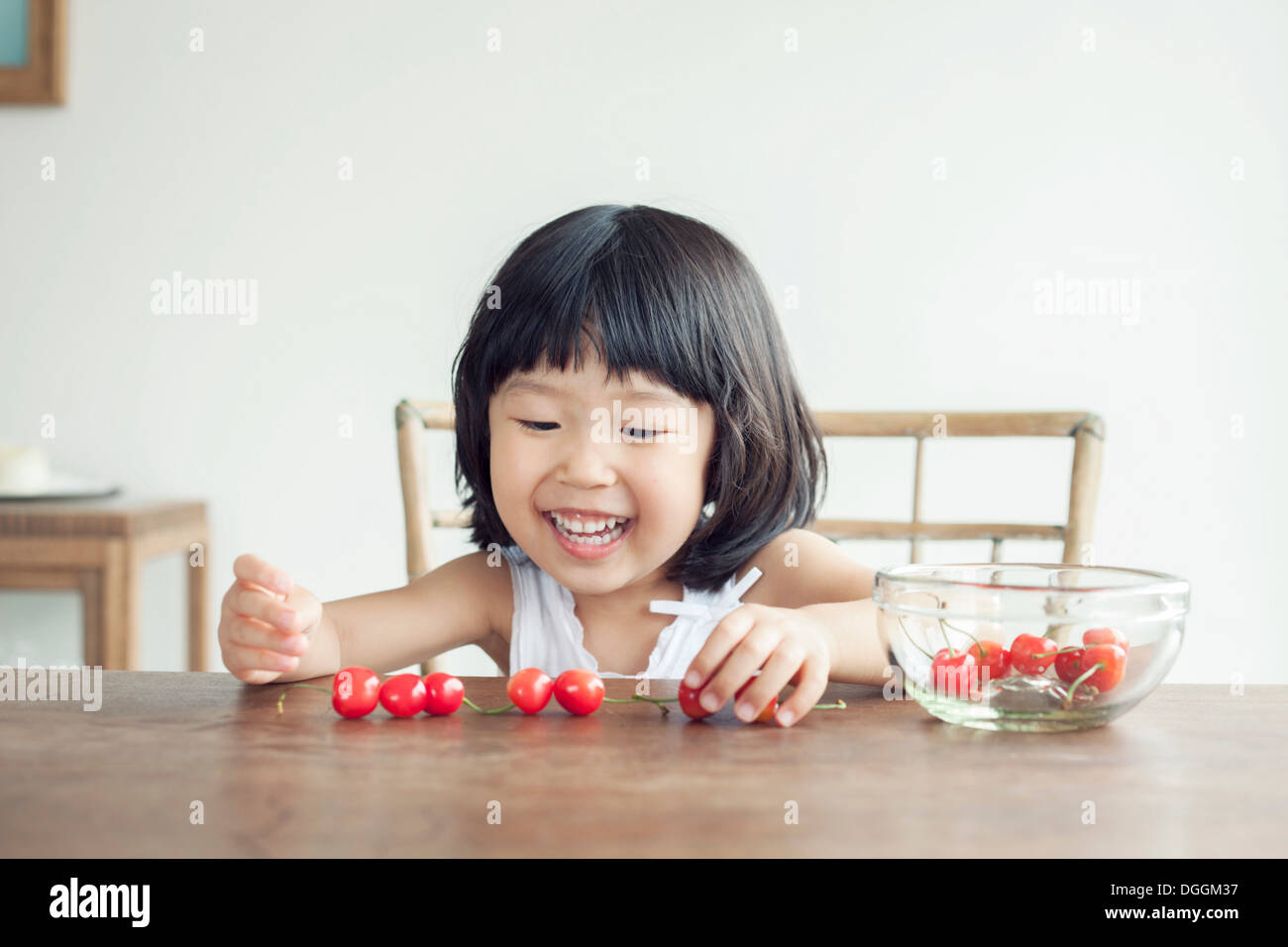Children eating cherries hi-res stock photography and images - Alamy