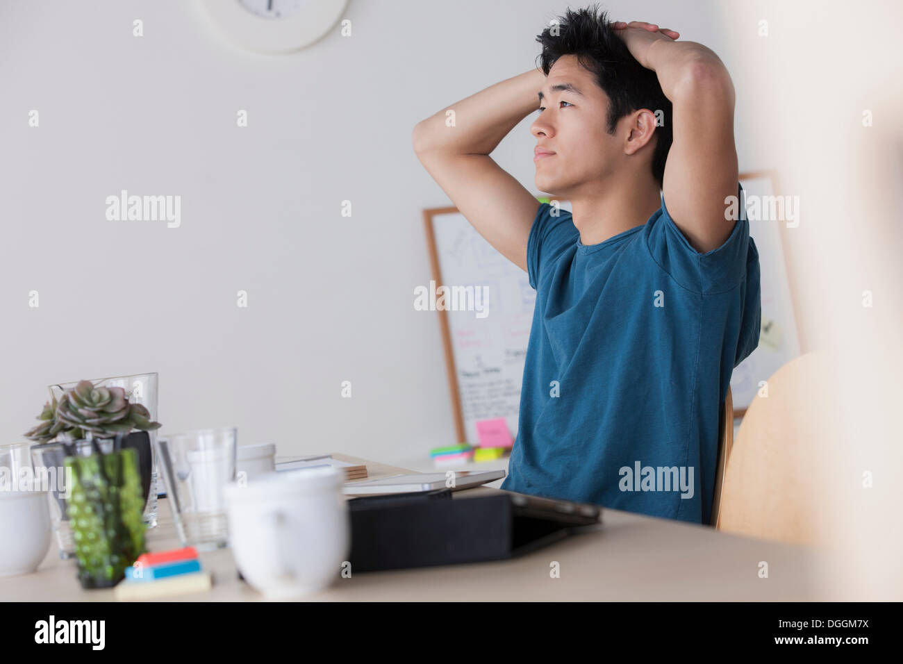 Male office worker sitting hi-res stock photography and images - Alamy