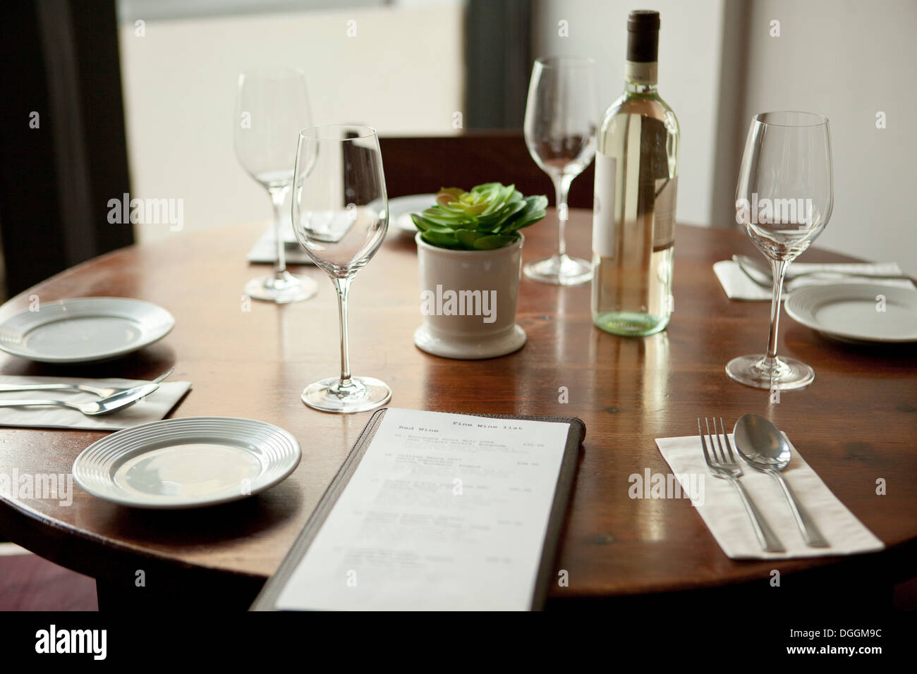 Table setting in restaurant Stock Photo - Alamy