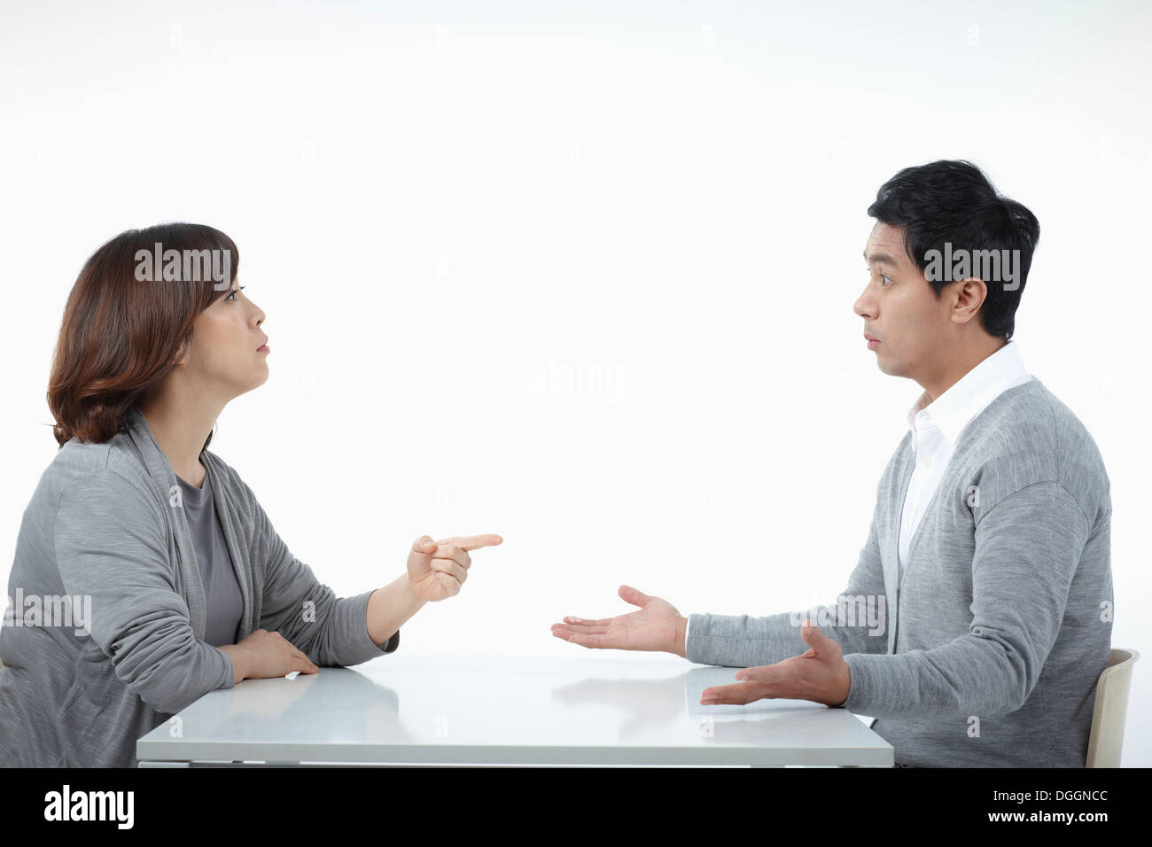 Two people arguing in a group hi-res stock photography and images - Alamy