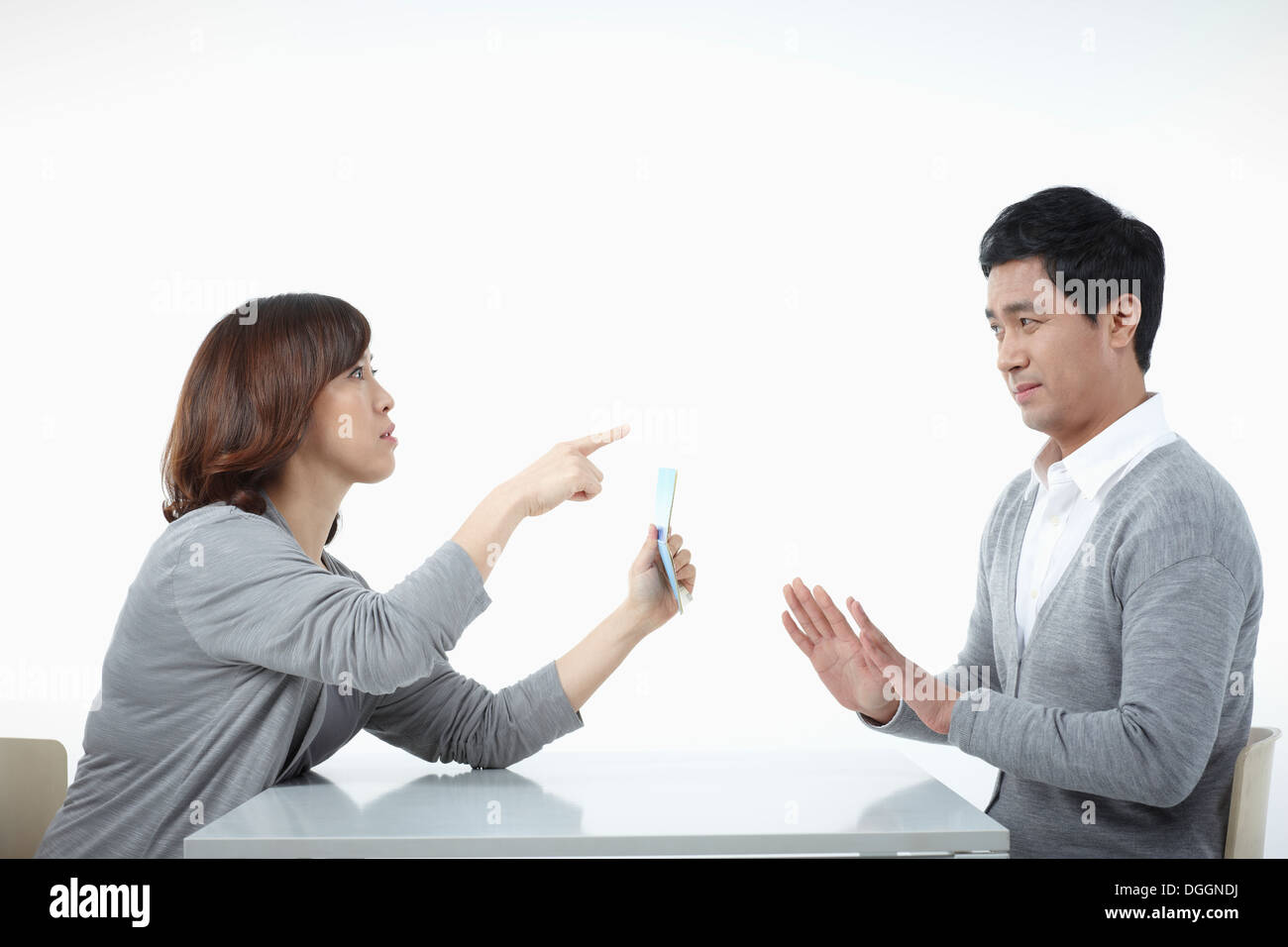 Two people arguing in a group hi-res stock photography and images - Alamy