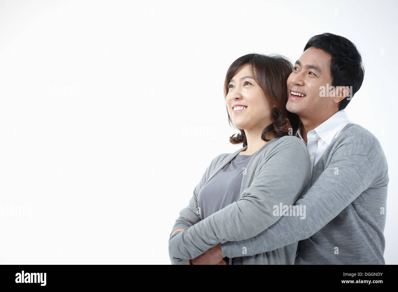 Two people hugging in Cut Out Stock Images & Pictures - Alamy