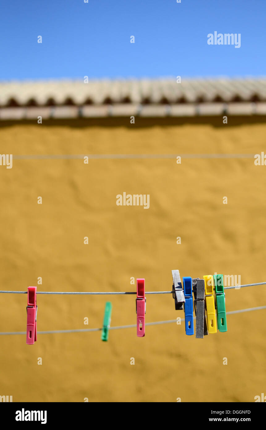 Assorted colored clothes pegs Stock Photo - Alamy