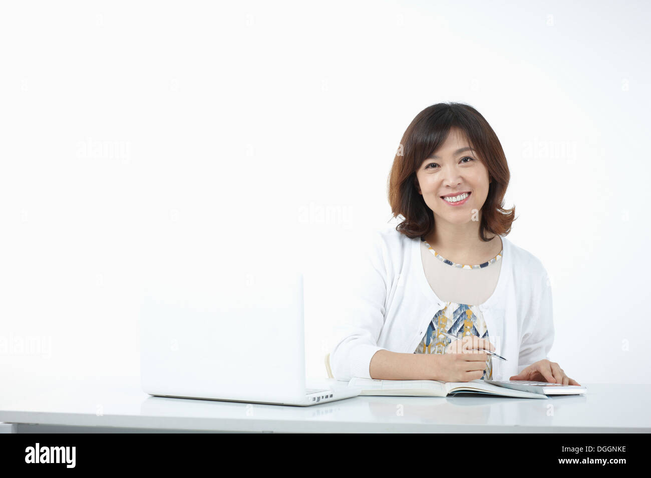 a woman thinking and writing Stock Photo - Alamy