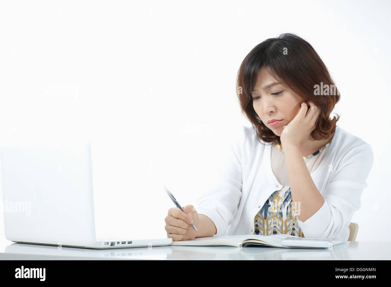 a woman thinking and writing Stock Photo - Alamy