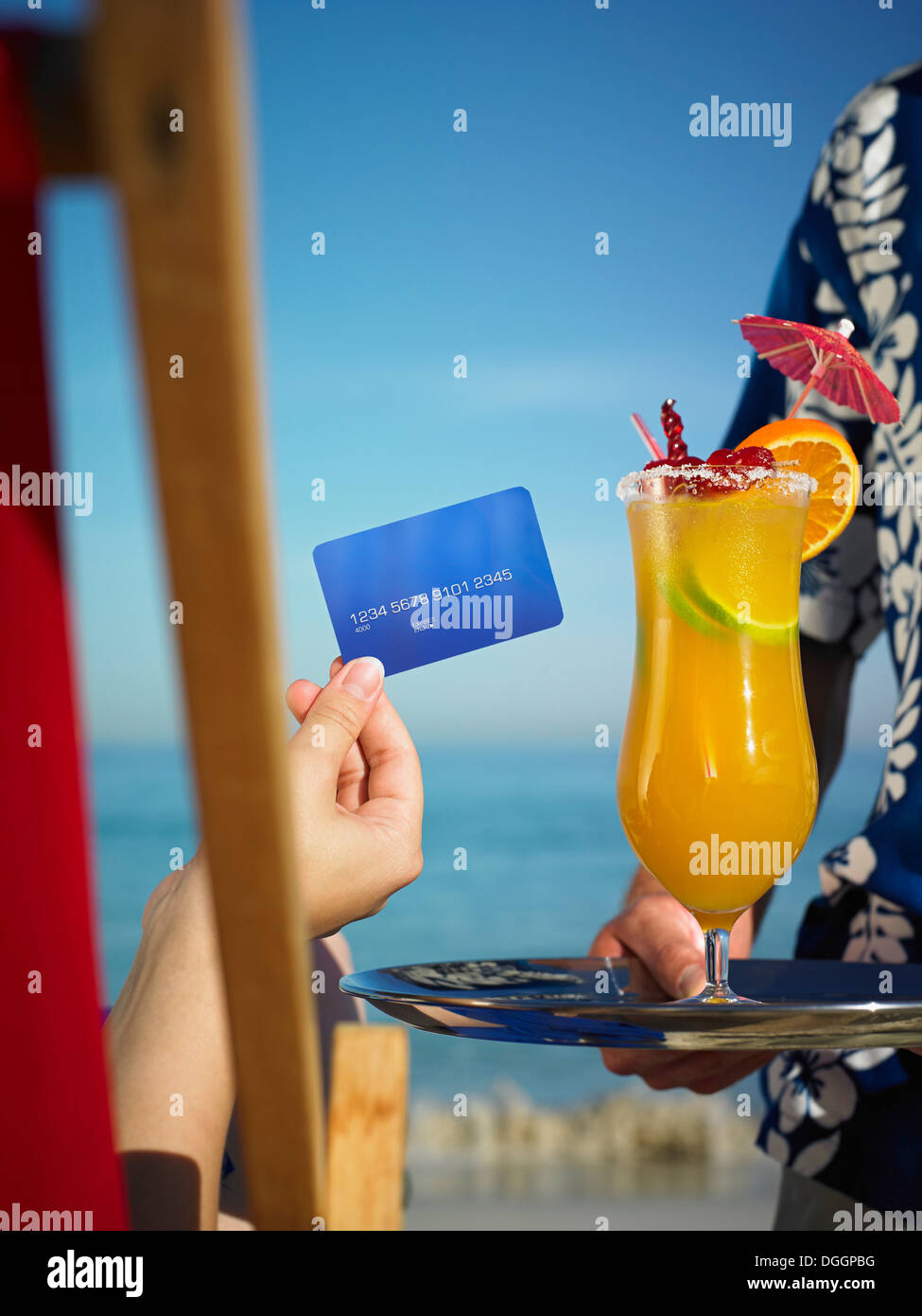 Woman paying service credit card hi-res stock photography and images ...