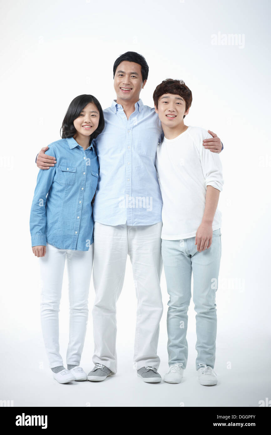 father standing with his son and daughter Stock Photo - Alamy