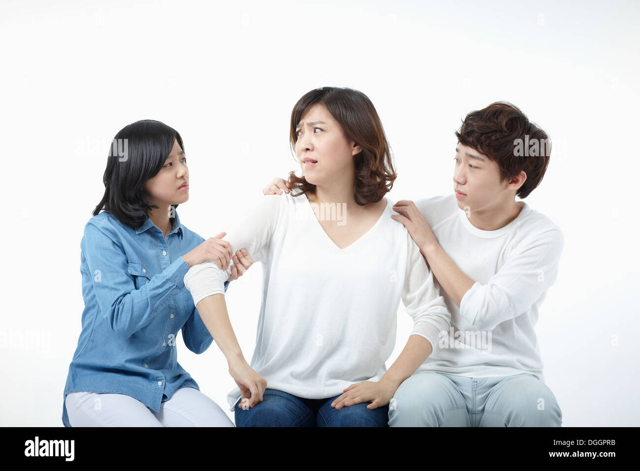 kids nagging to their mother Stock Photo - Alamy