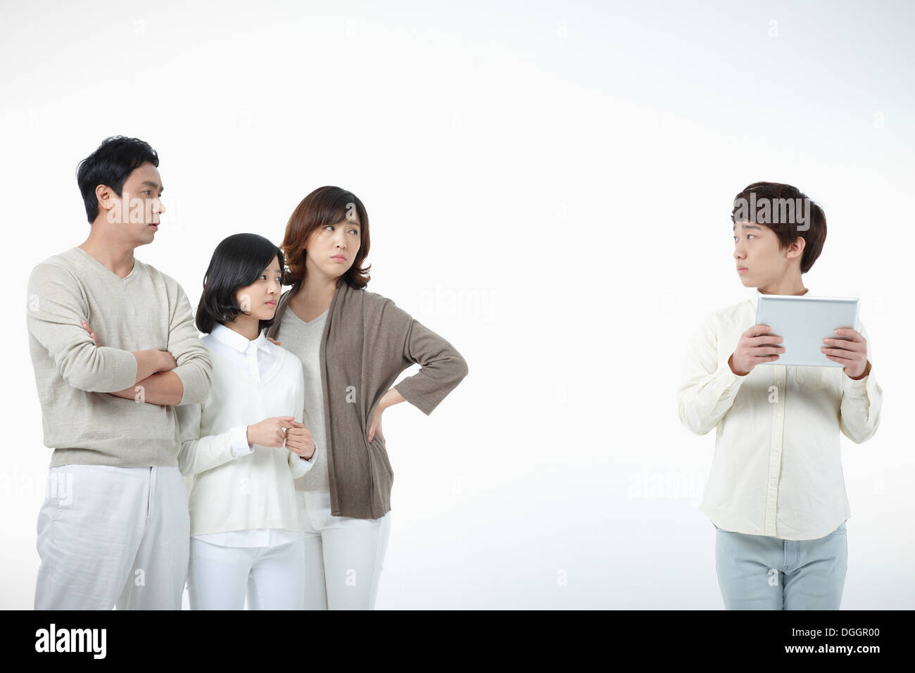 Family playing tablet hi-res stock photography and images - Alamy